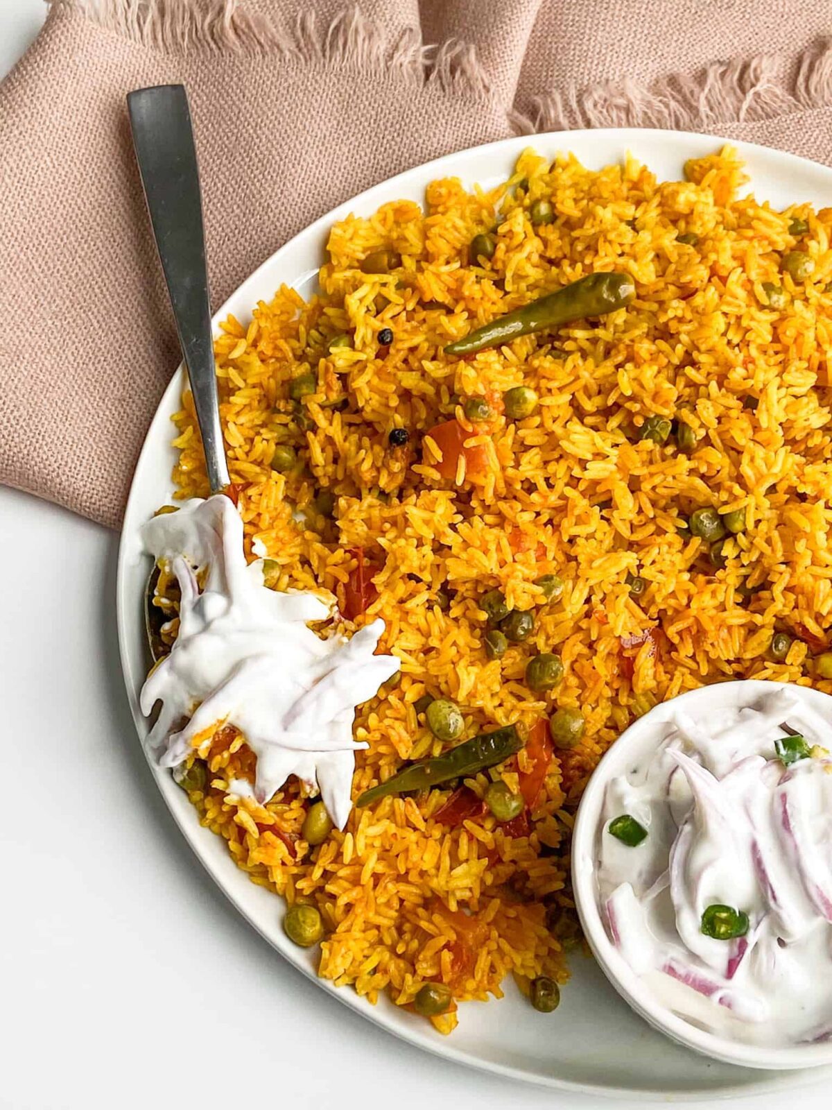 One Pot Vegetable Spicy Rice with Onion Raita - Feast with Safiya